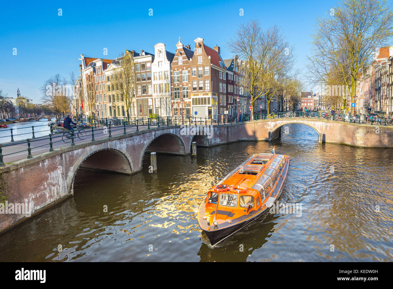 Amsterdam city with dutch old buildings and boat in Amsterdam city ...