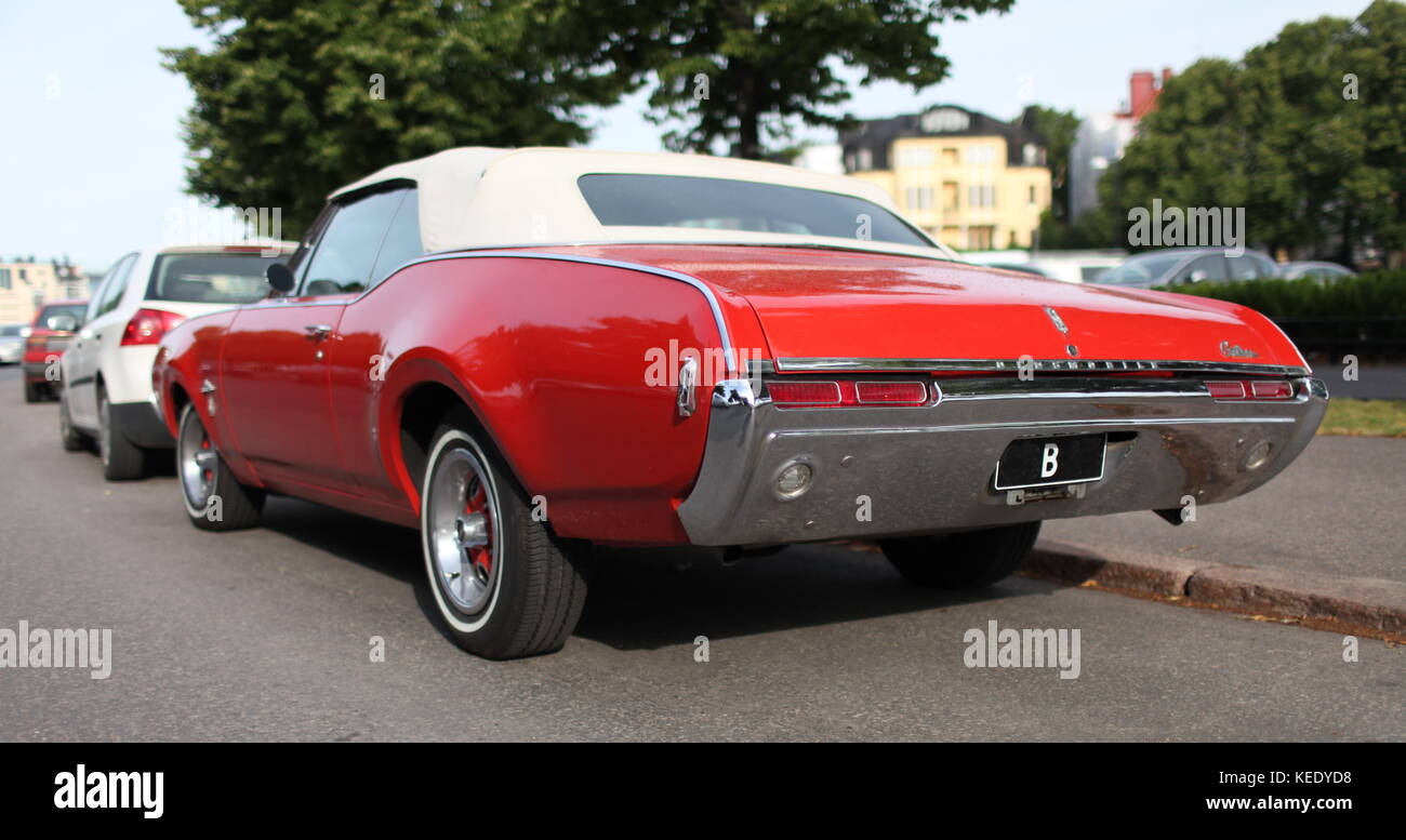 vintage Olds automobiles on a city street, rear view Stock Photo - Alamy