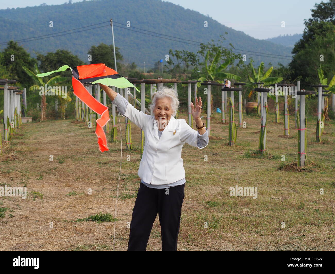 Healthy Asian senior woman enjoying her day outdoors Stock Photo - Alamy