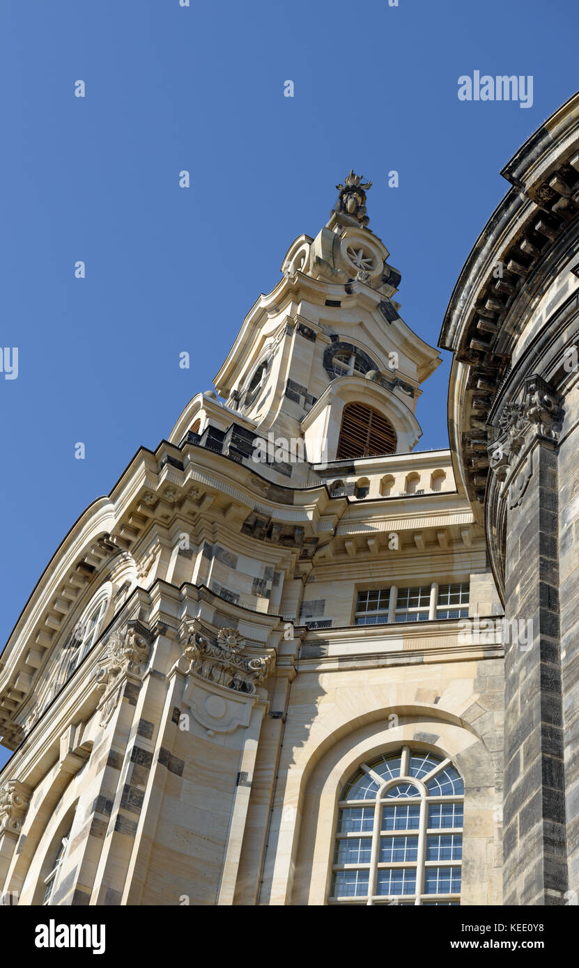 Close-up one of side turrets of famous Frauenkirche church on blue sky ...