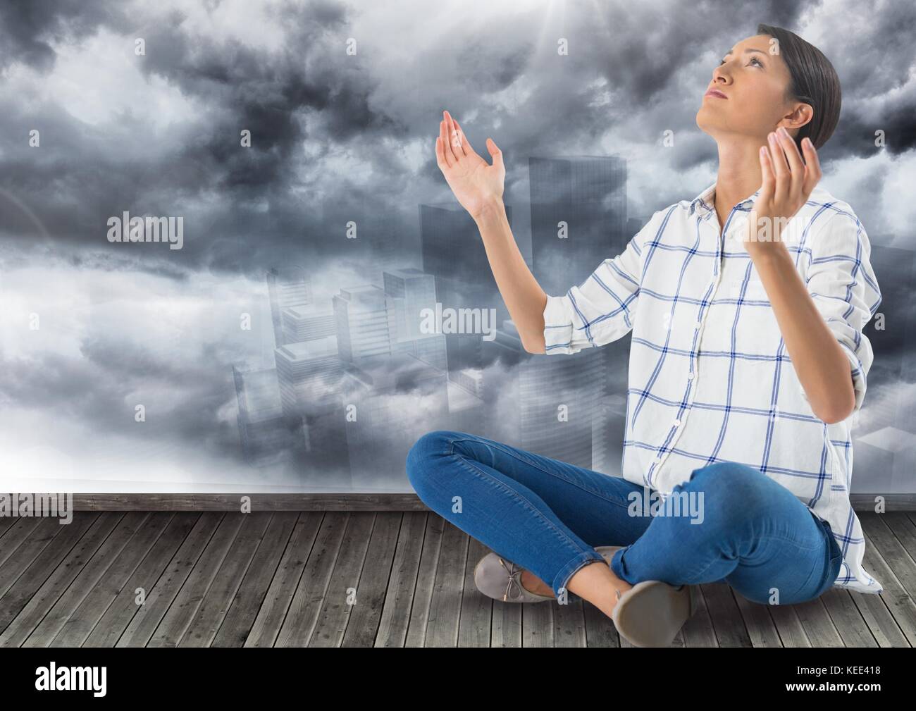 Digital composite of Woman asking hopefully to the sky Stock Photo - Alamy