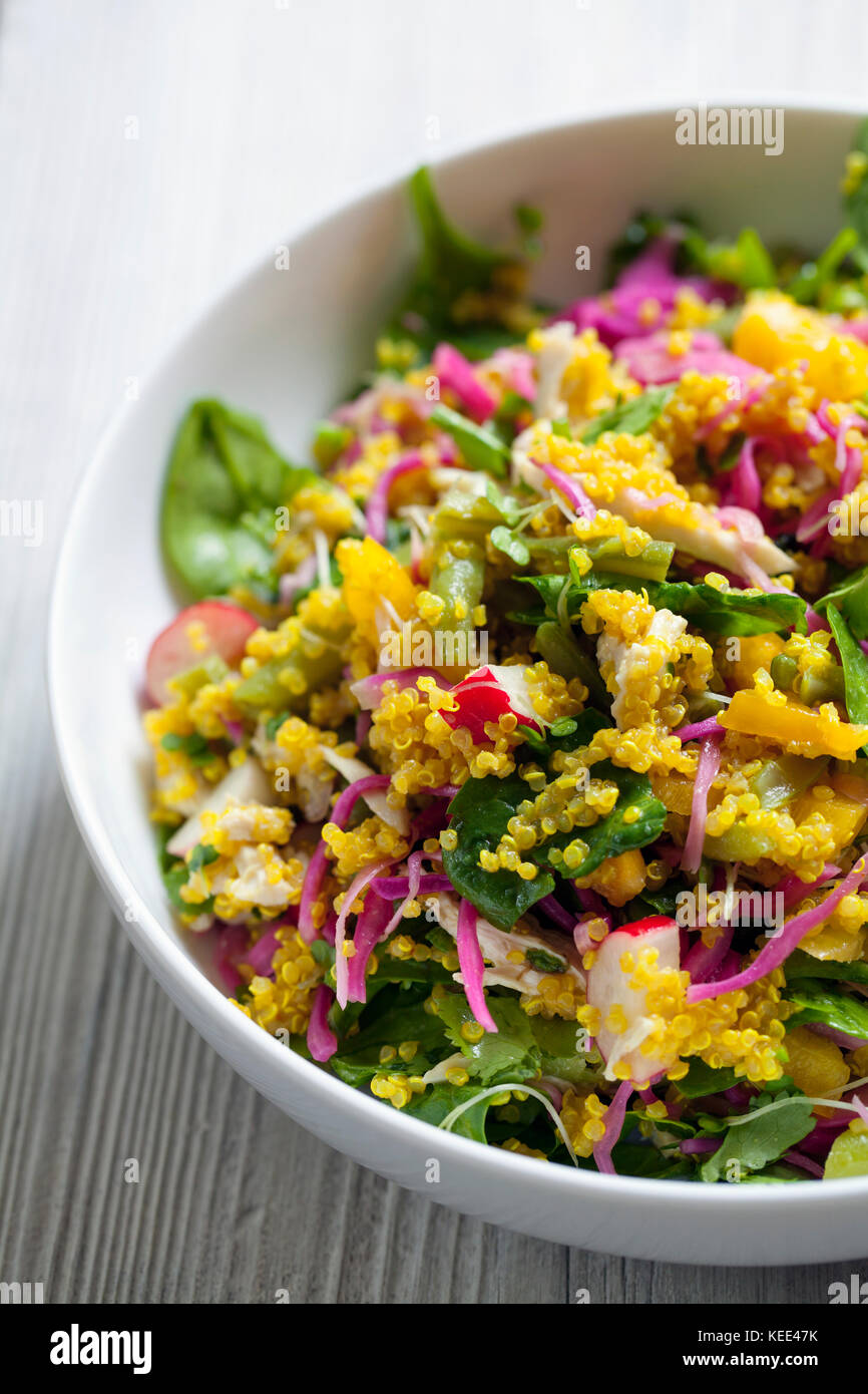 Turmeric infused quinoa with pickled red cabbage, radishes, spinach and ...