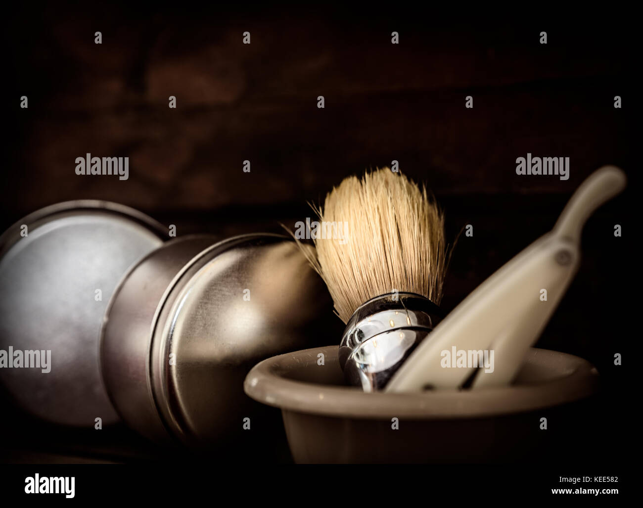 barber shop accessories with razor and soap brush toned in old style ...