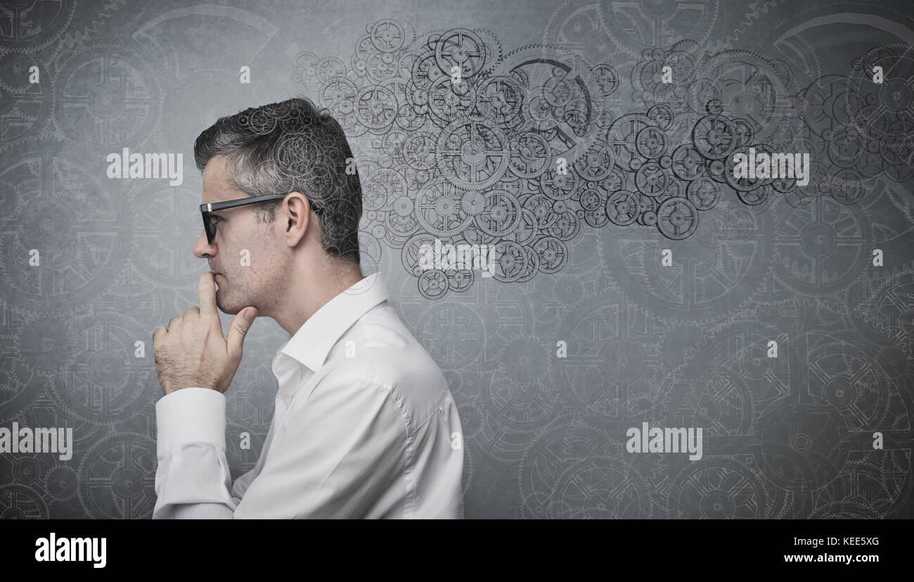 Businessman on gears hi-res stock photography and images - Alamy