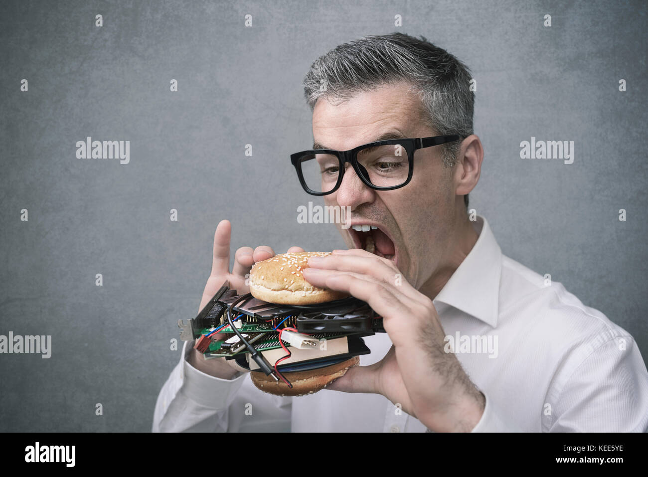 Greedy man eating hi-res stock photography and images - Alamy