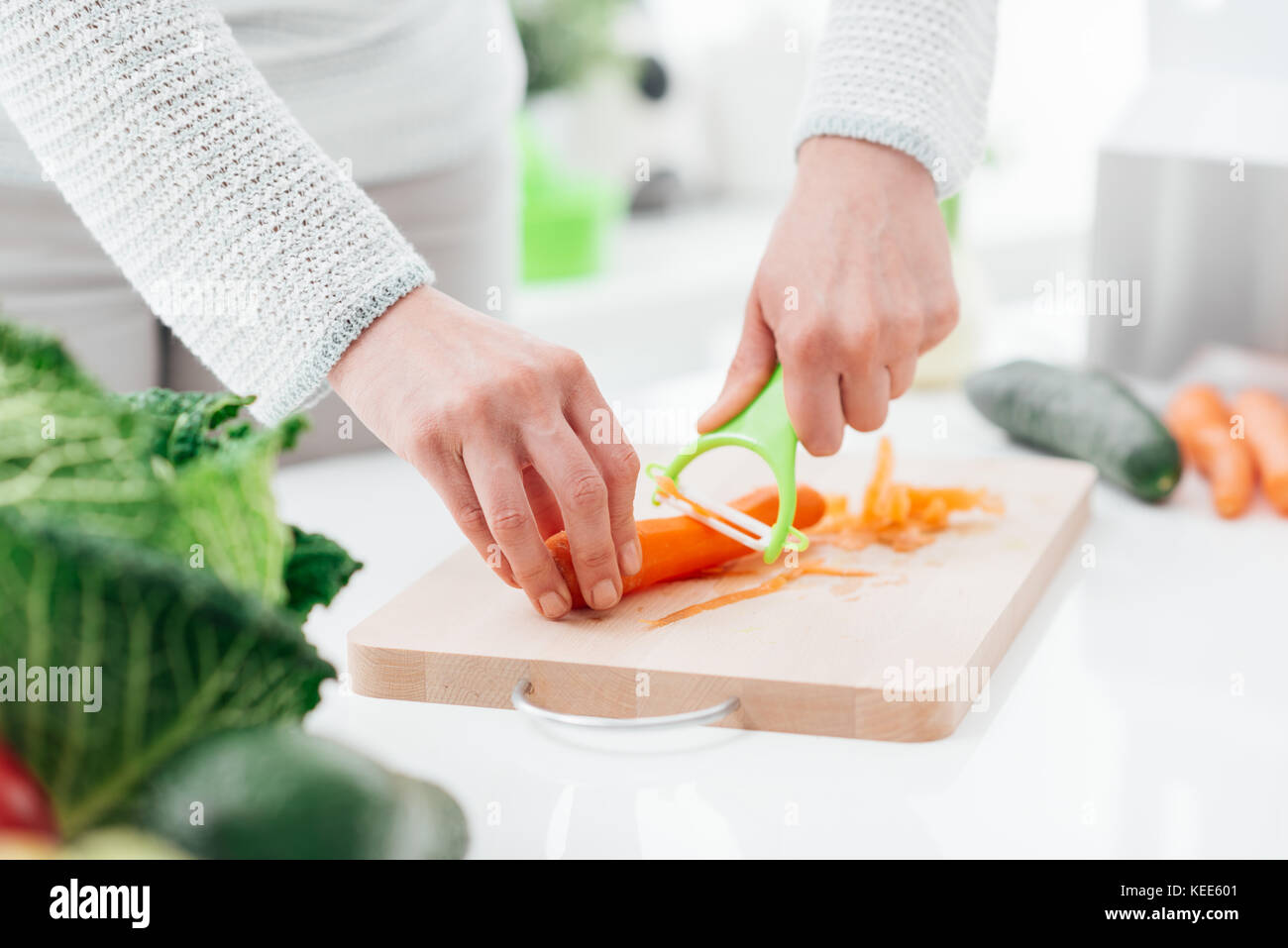 Preparing Food In Kitchen Peeling High Resolution Stock Photography and ...