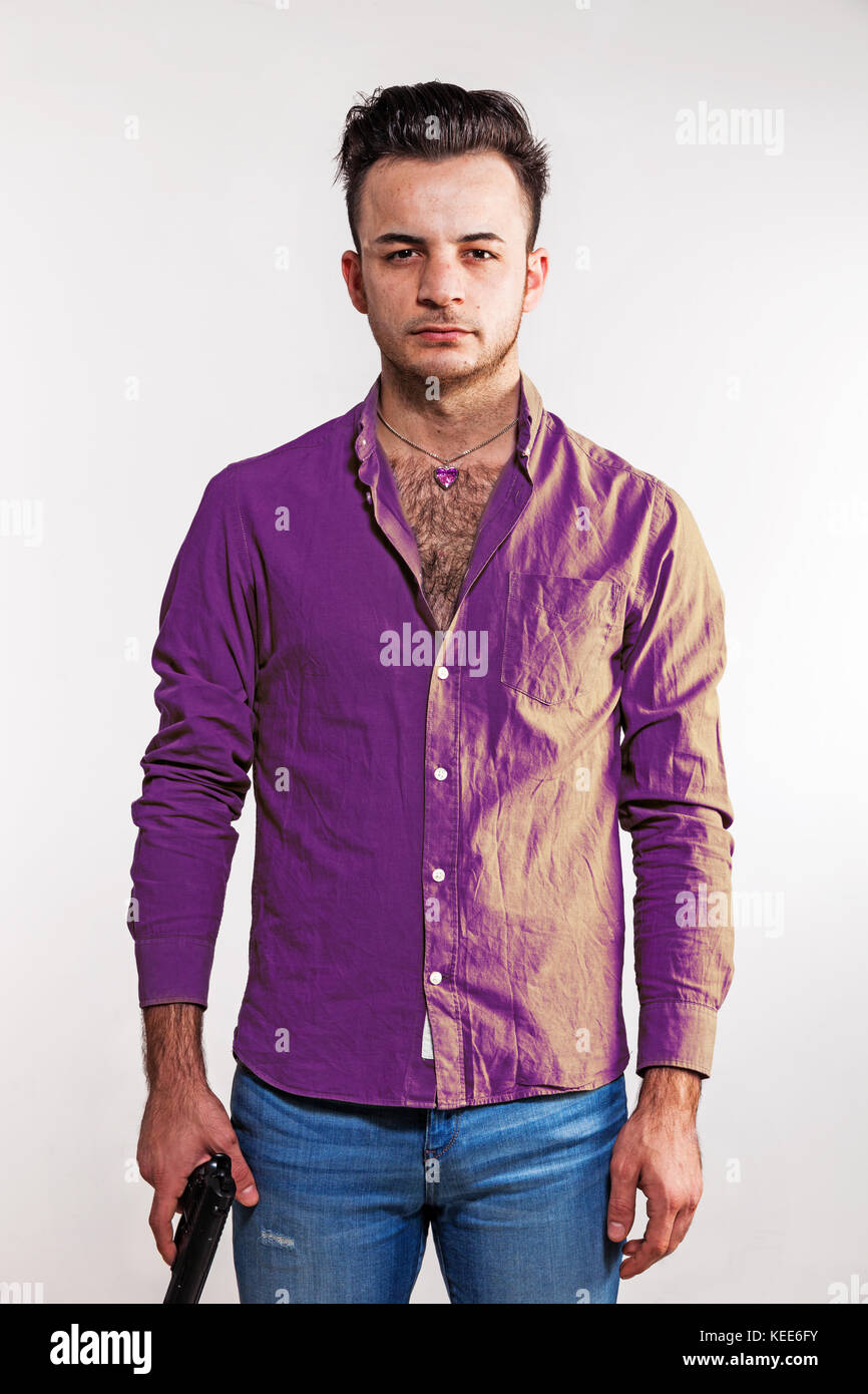 Boy with gun on white background Stock Photo - Alamy