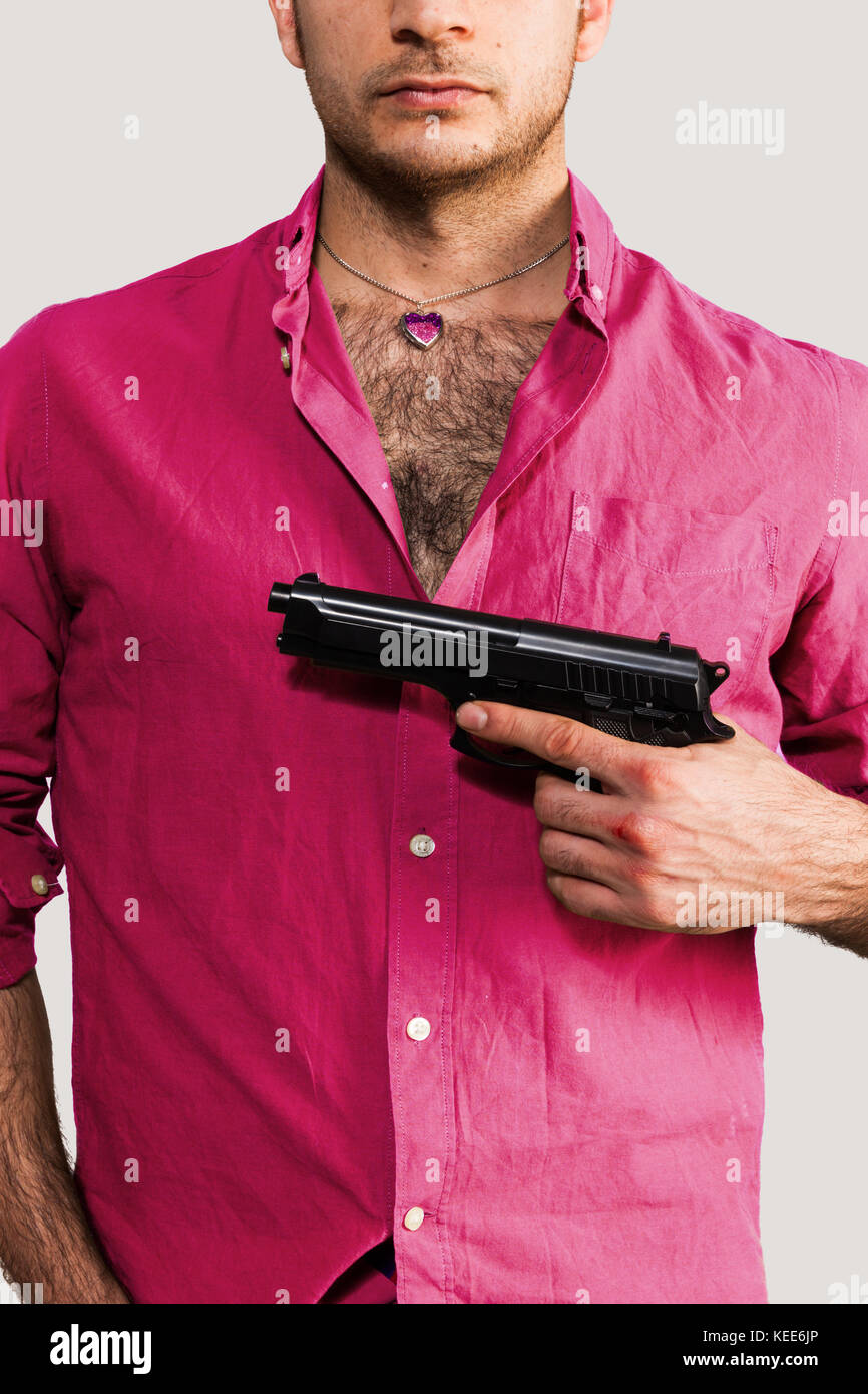 Boy with gun on white background Stock Photo - Alamy