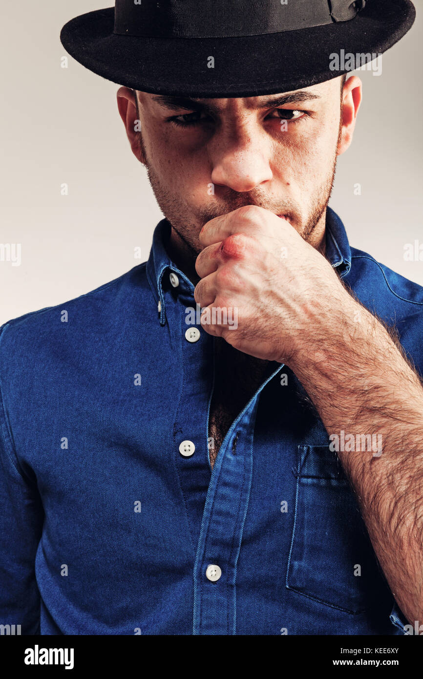 Man on white background, Mysterious look Stock Photo - Alamy