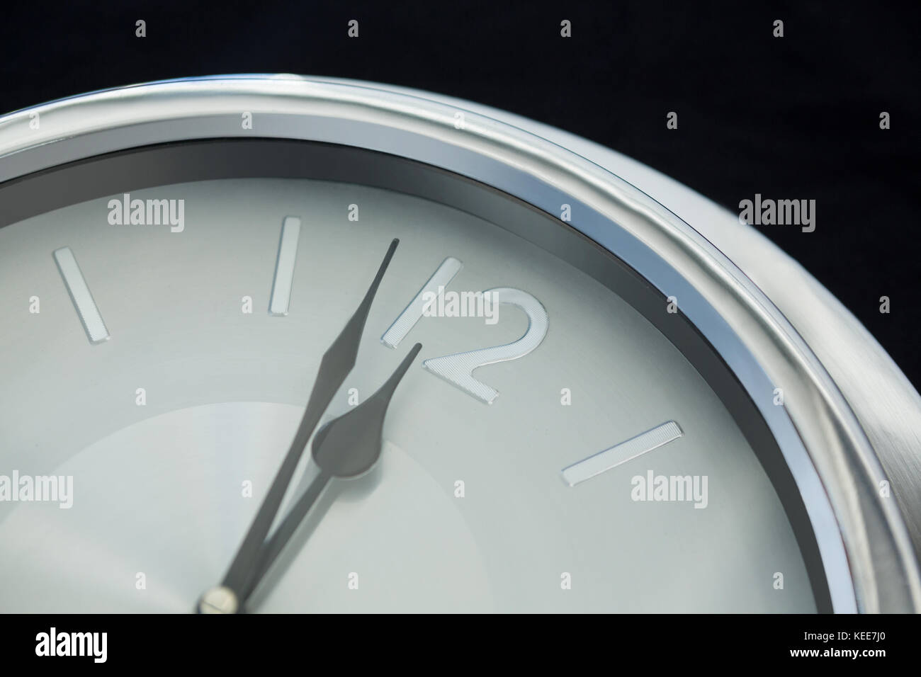 Clock hands reaching 12 clock midnight on new year 2018 Stock Photo - Alamy