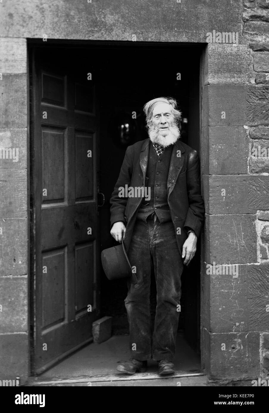Scruffy man in suit Black and White Stock Photos & Images - Alamy