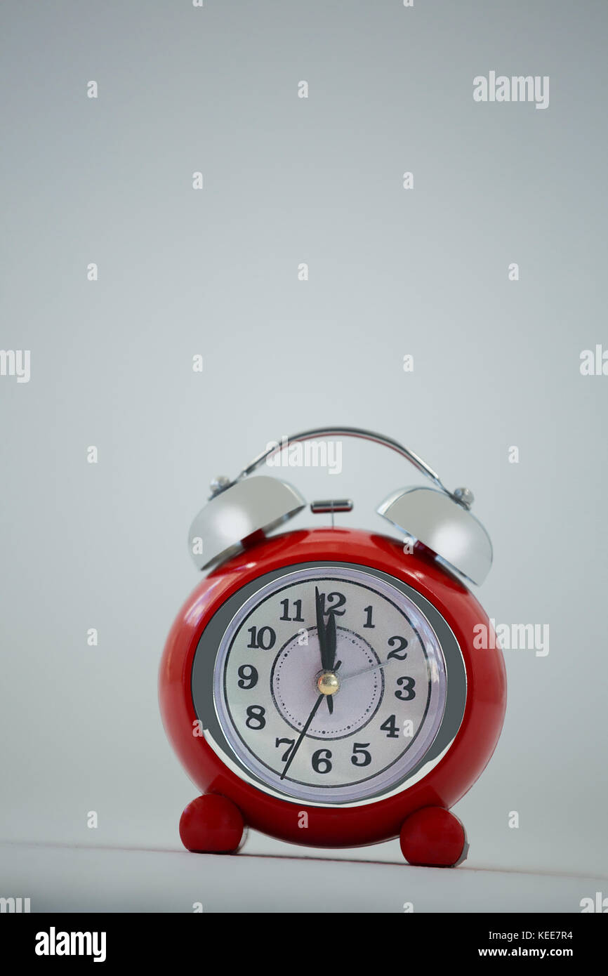 Clock hands reaching 12 clock midnight on new year 2018 against white ...