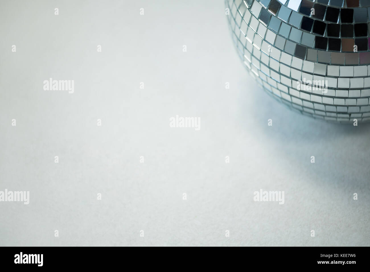 Close-up of mirror ball on white background Stock Photo - Alamy
