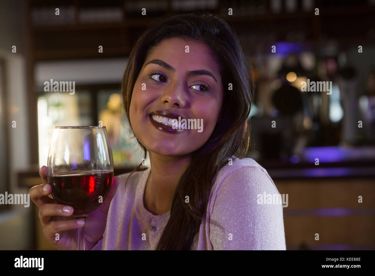 Beautiful woman holding wine glass Stock Photo - Alamy Beautiful woman holding wine glass Stock Photo - Alamy