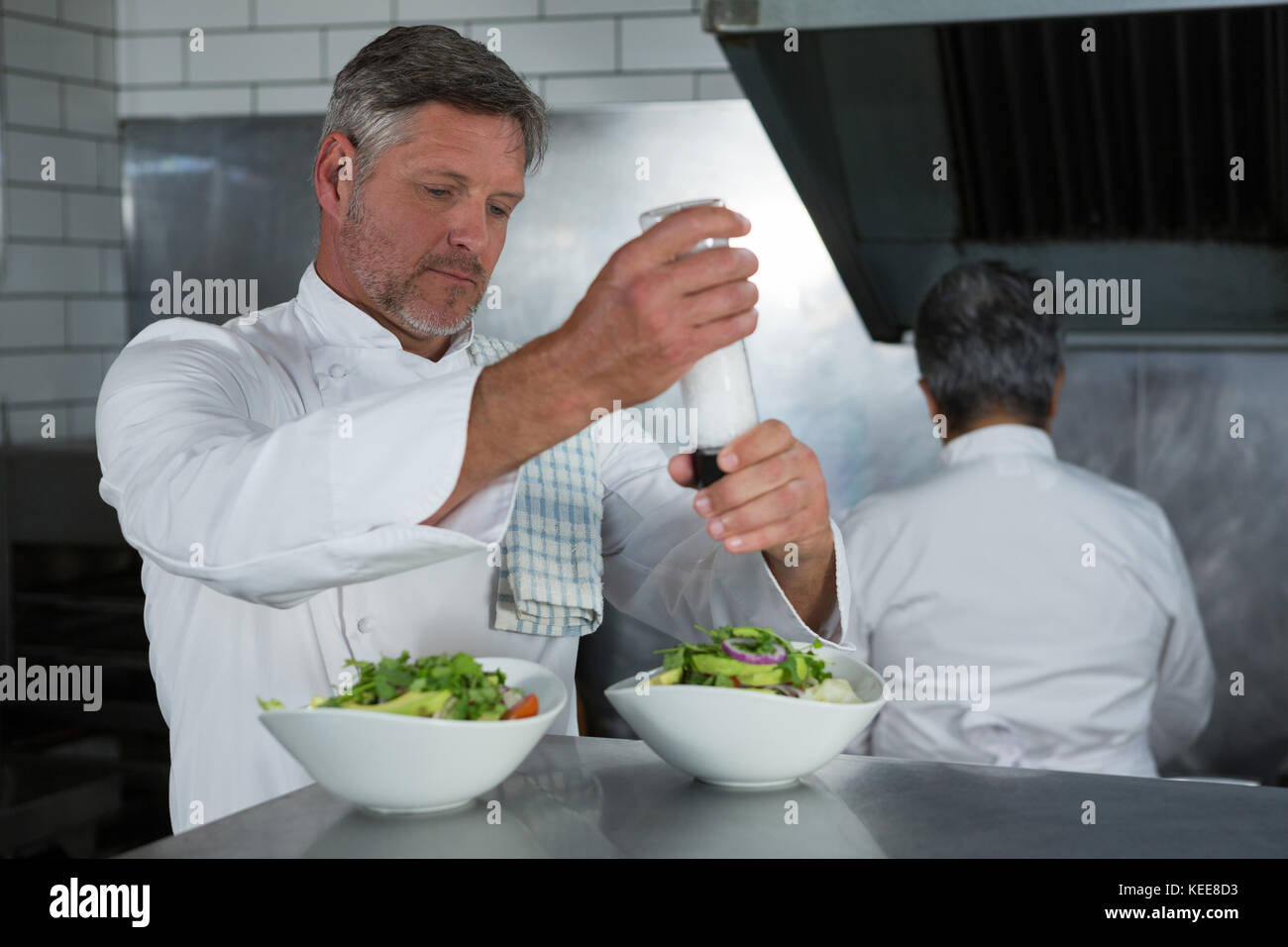 Chef preparing food in the kitchen Stock Photo - Alamy