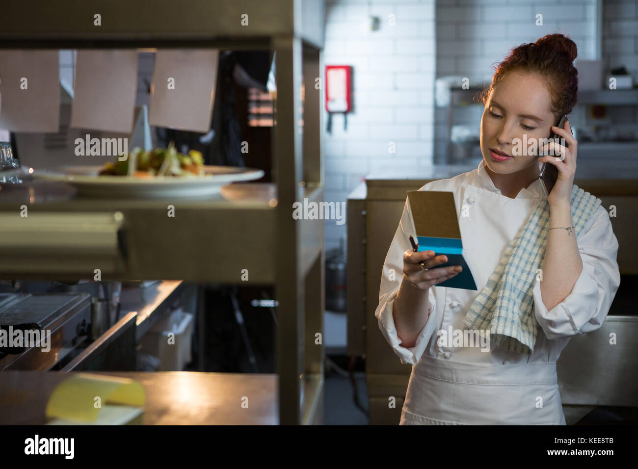 Professional chef talking on phone hi-res stock photography and images ...