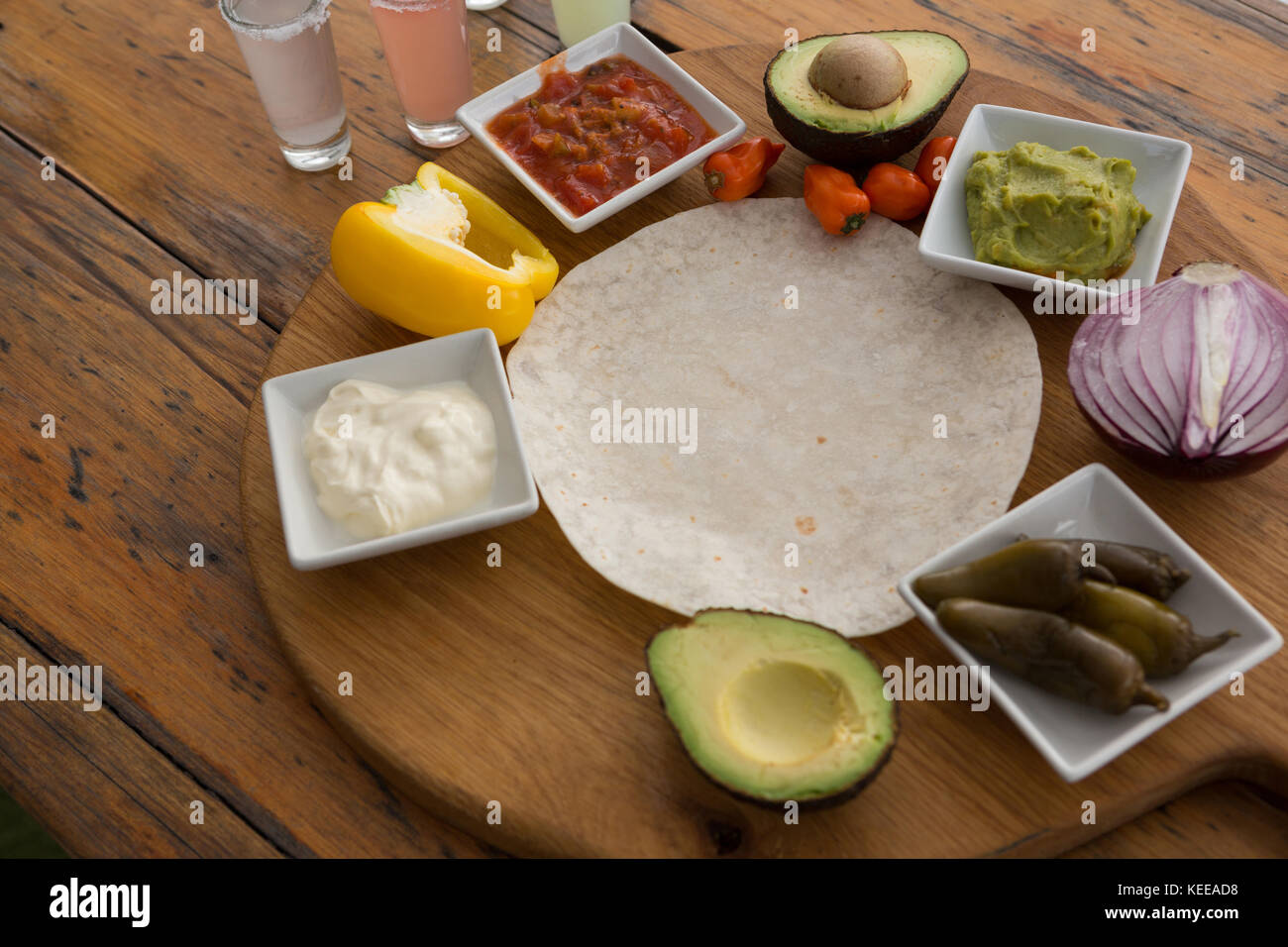 Various mexican food ingredients on wooden table Stock Photo - Alamy