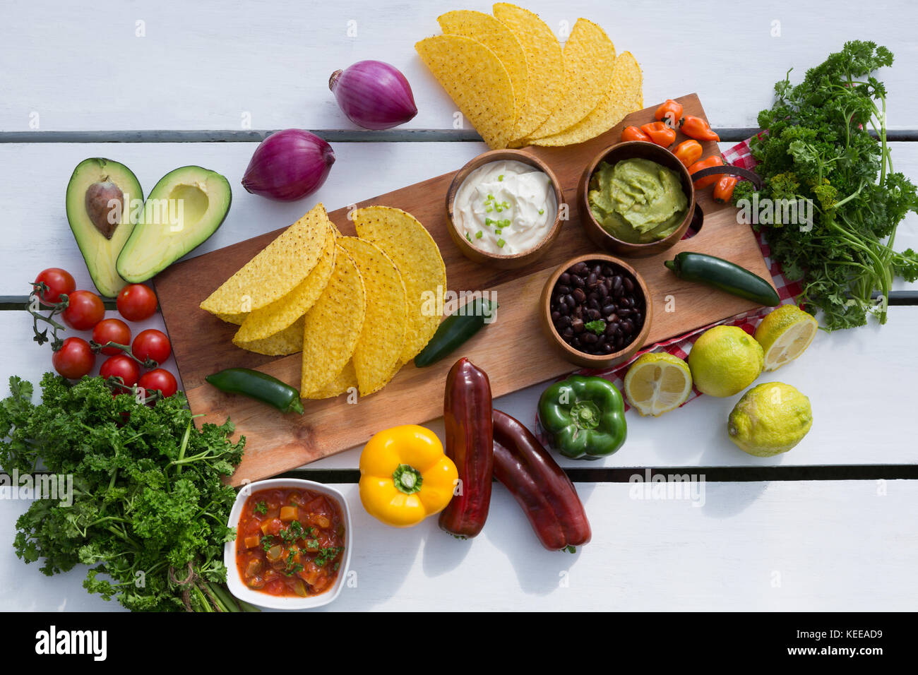 Various mexican food ingredients on wooden table Stock Photo - Alamy