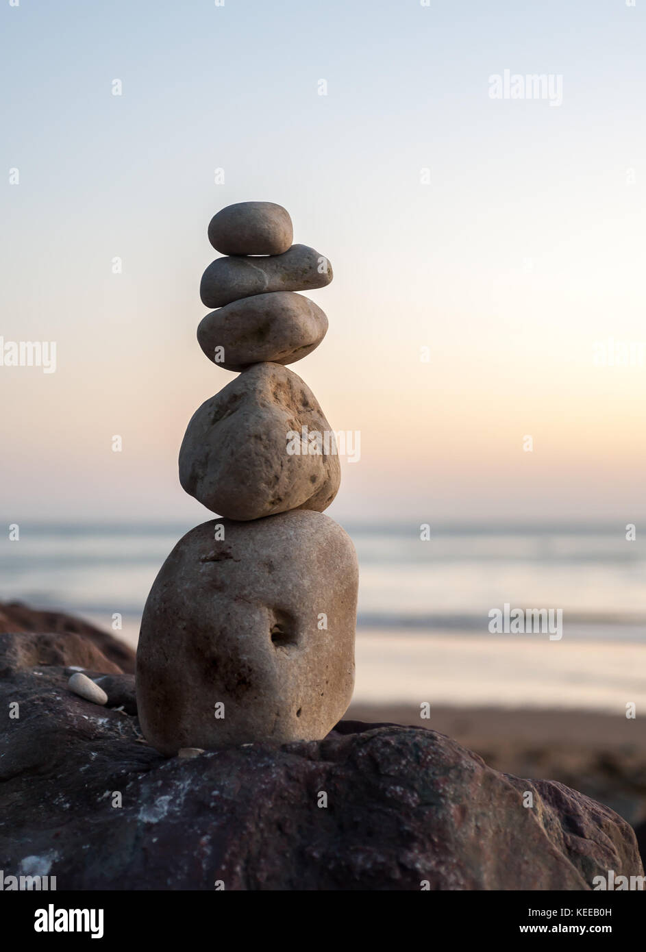 Closeup of a pile of stacked pebbles on the beach Stock Photo - Alamy