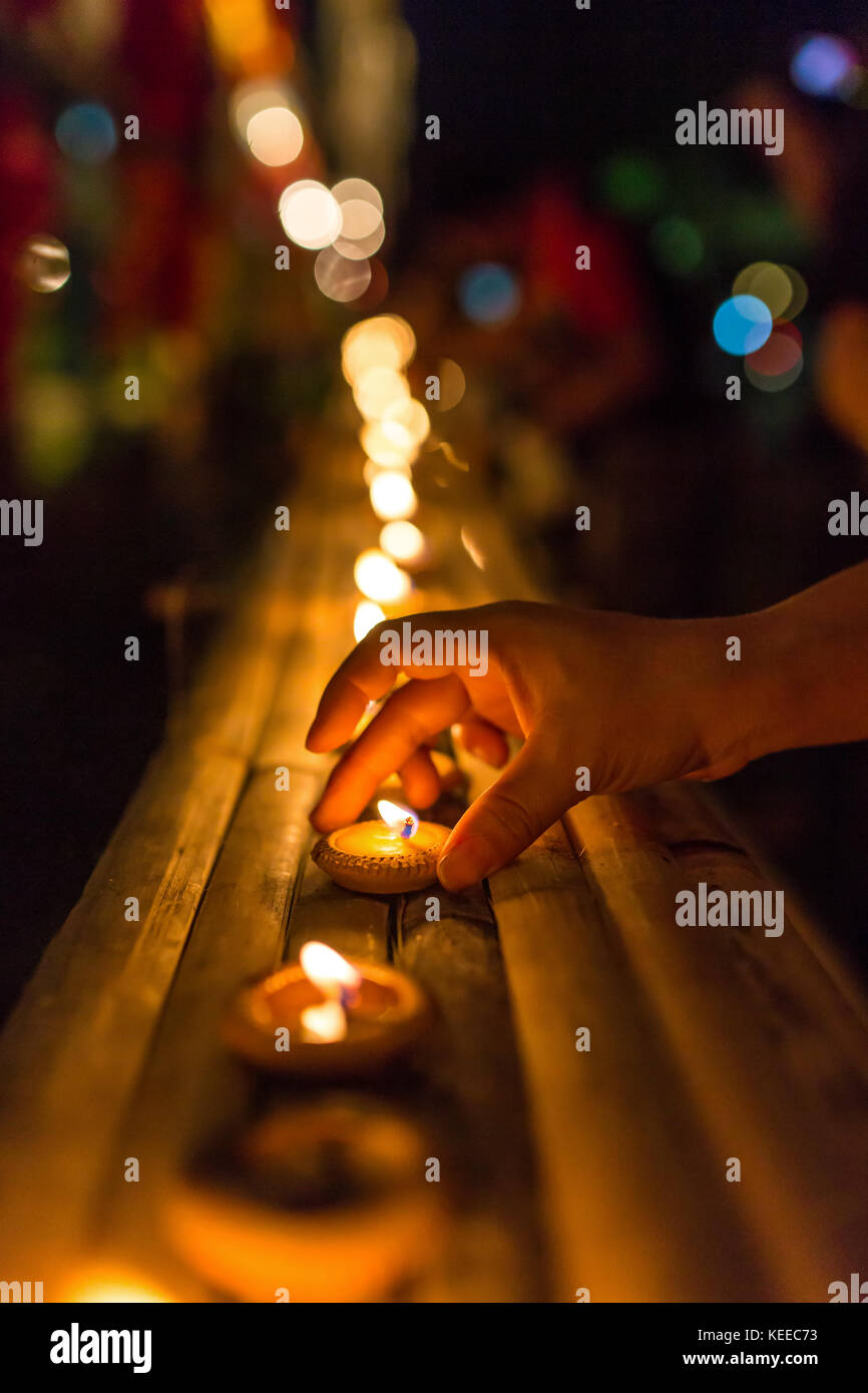 Thai people fire candles in Wat Phan Tao Temple during Yi Peng Festival ...