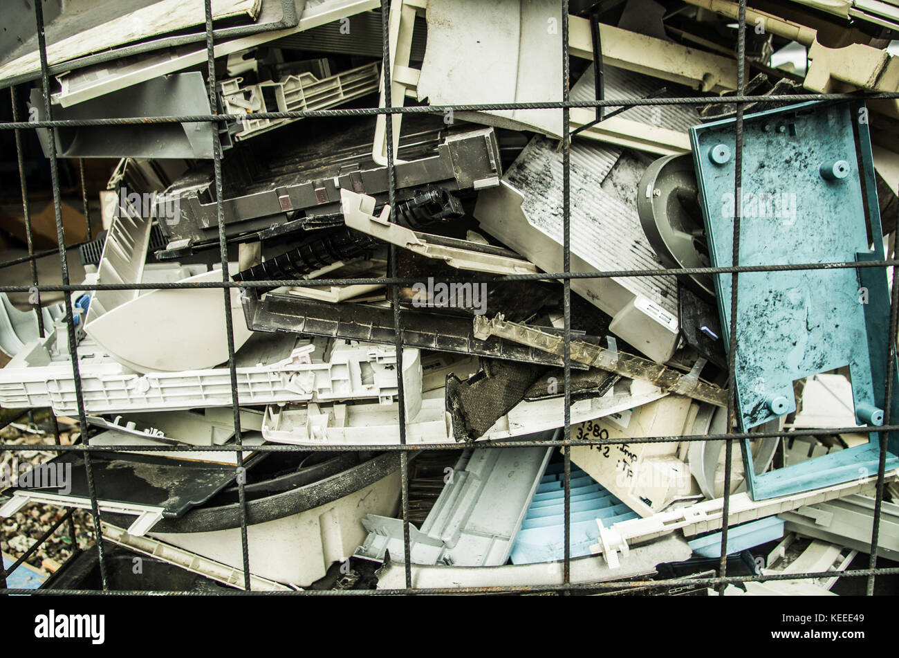 Close up of a pile of old, broken, and dusty laptops in a pile for ...