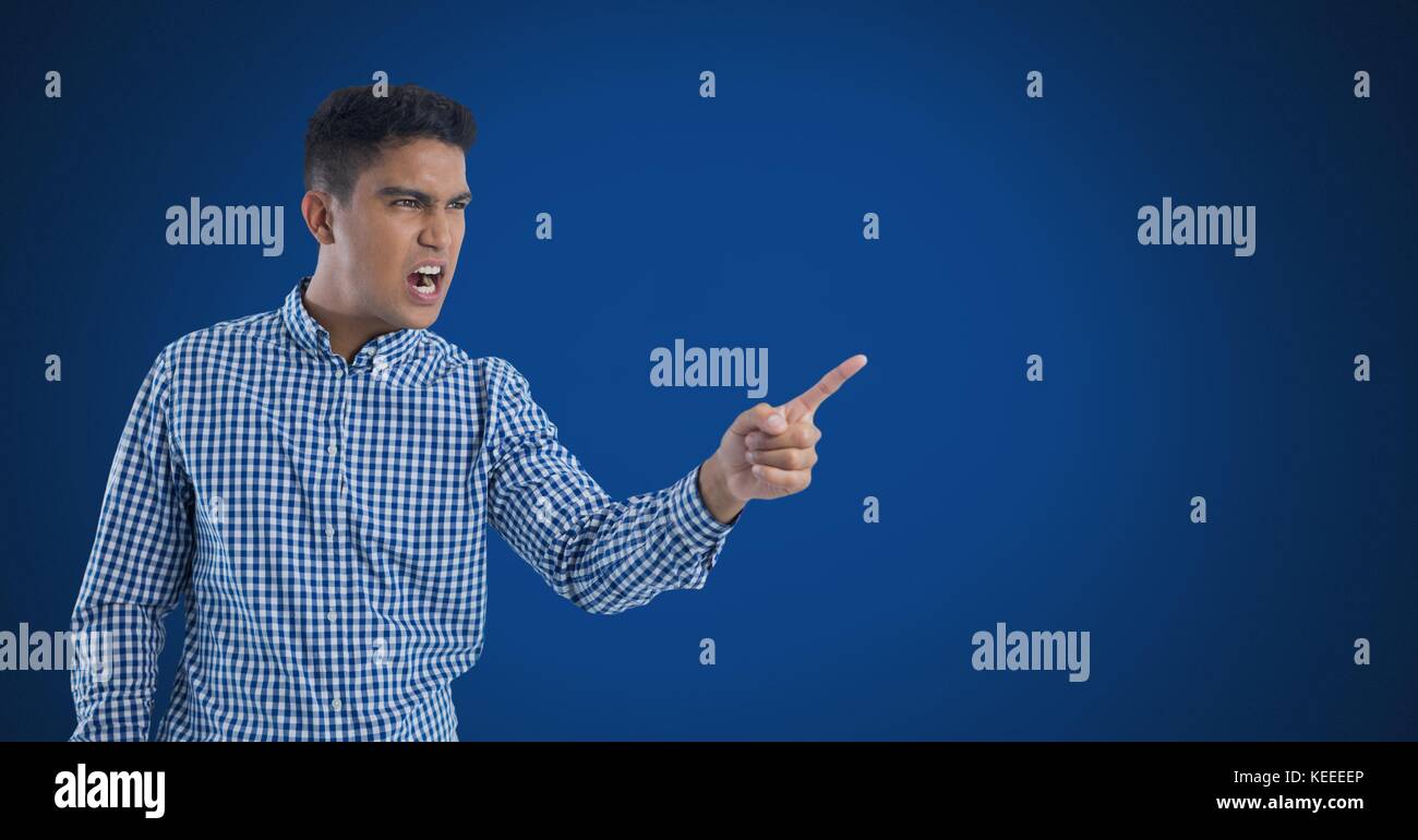 Digital composite of Businessman shouting and pointing angrily with ...