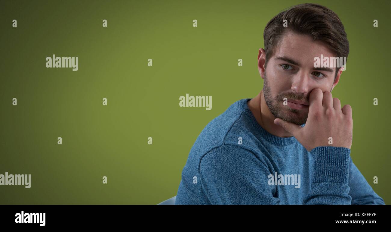 Digital composite of Businessman thinking with green background Stock ...