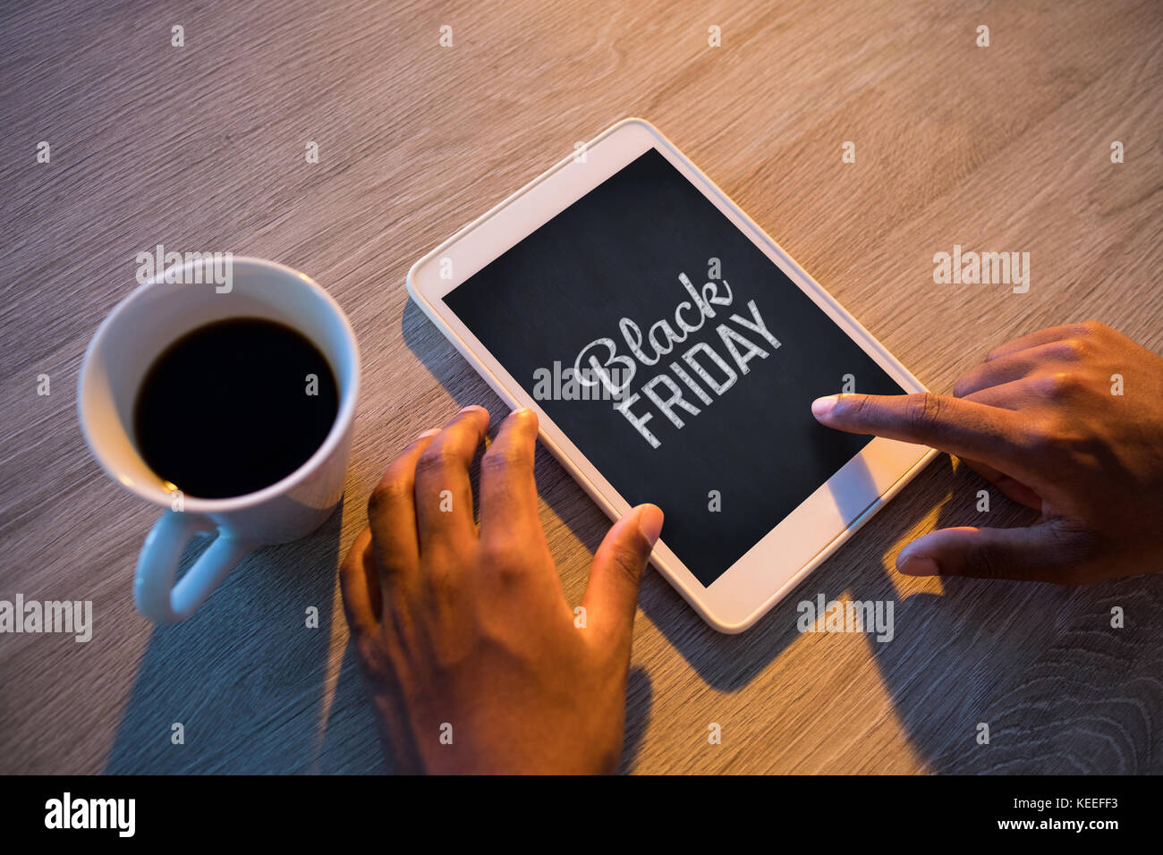 Black friday advert against cropped hands of buisnessman using digital ...