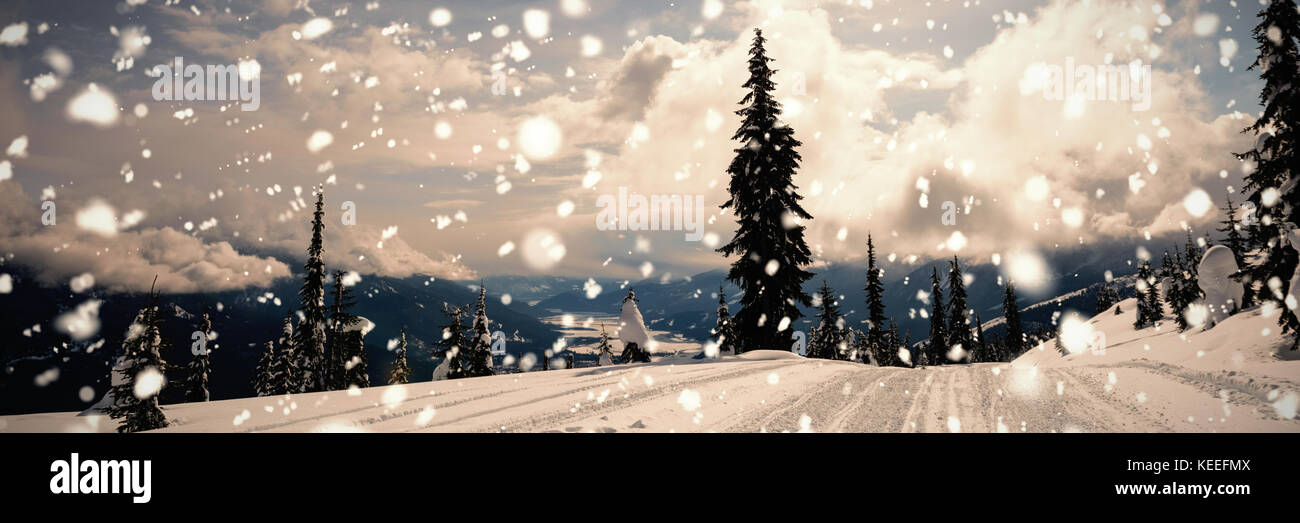 Sun shining on mountain road coated of snow Stock Photo - Alamy
