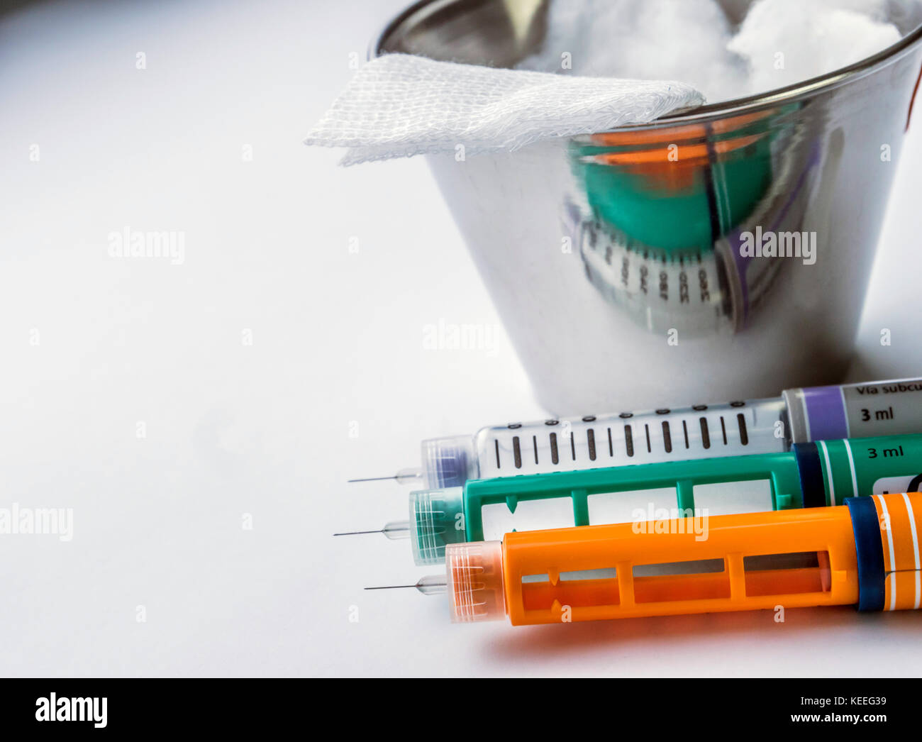 Insulin injection needle or pen for use by diabetics isolated on white ...