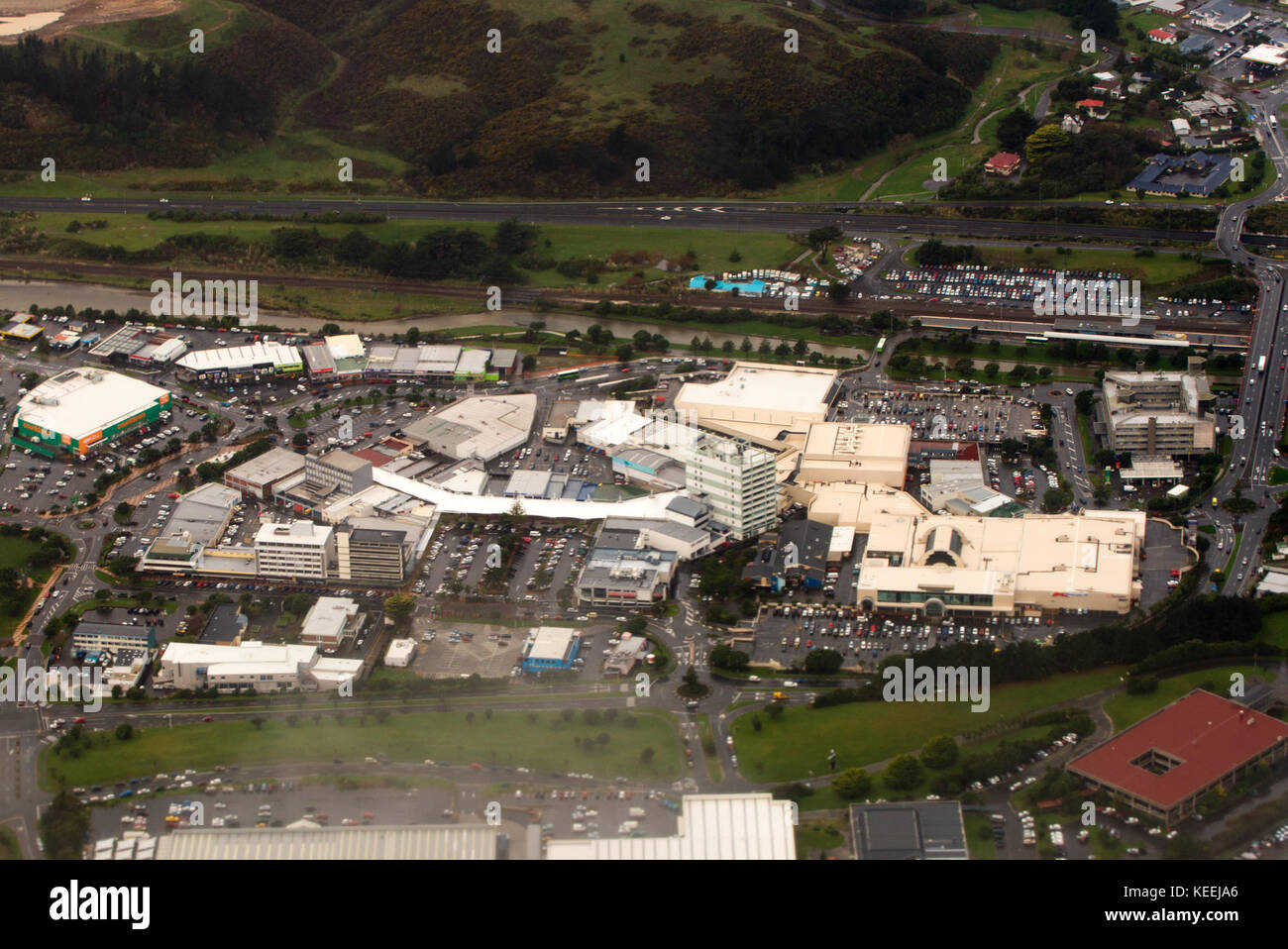 This aerial view shows Porirua City Centre and Porirua Station ...