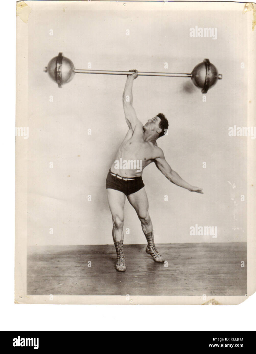 Lifting weights historic hi-res stock photography and images - Alamy