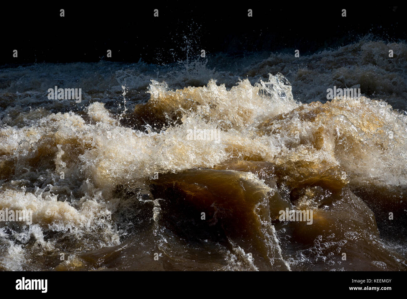 Watery abstract of the river Ure in full flow after heavy rain at ...