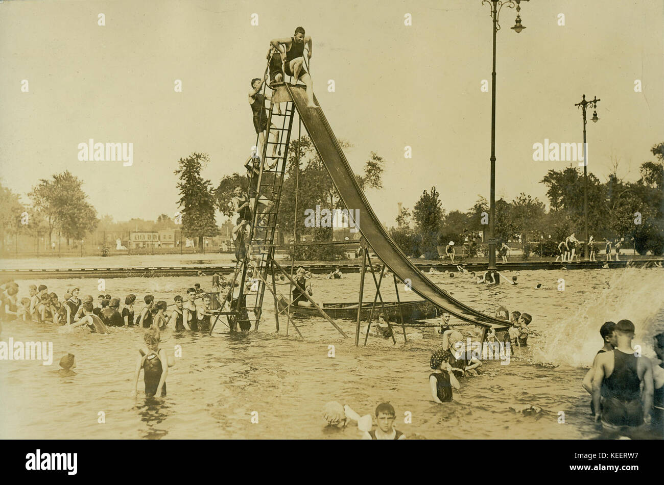 The popular slide. Young swimmers eagerly wait their turn at the water ...