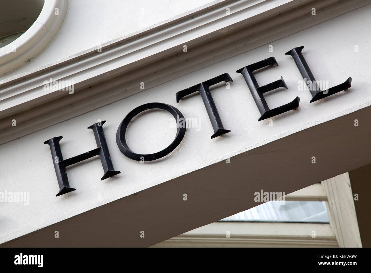 Hotel Sign on Building Facade Stock Photo - Alamy