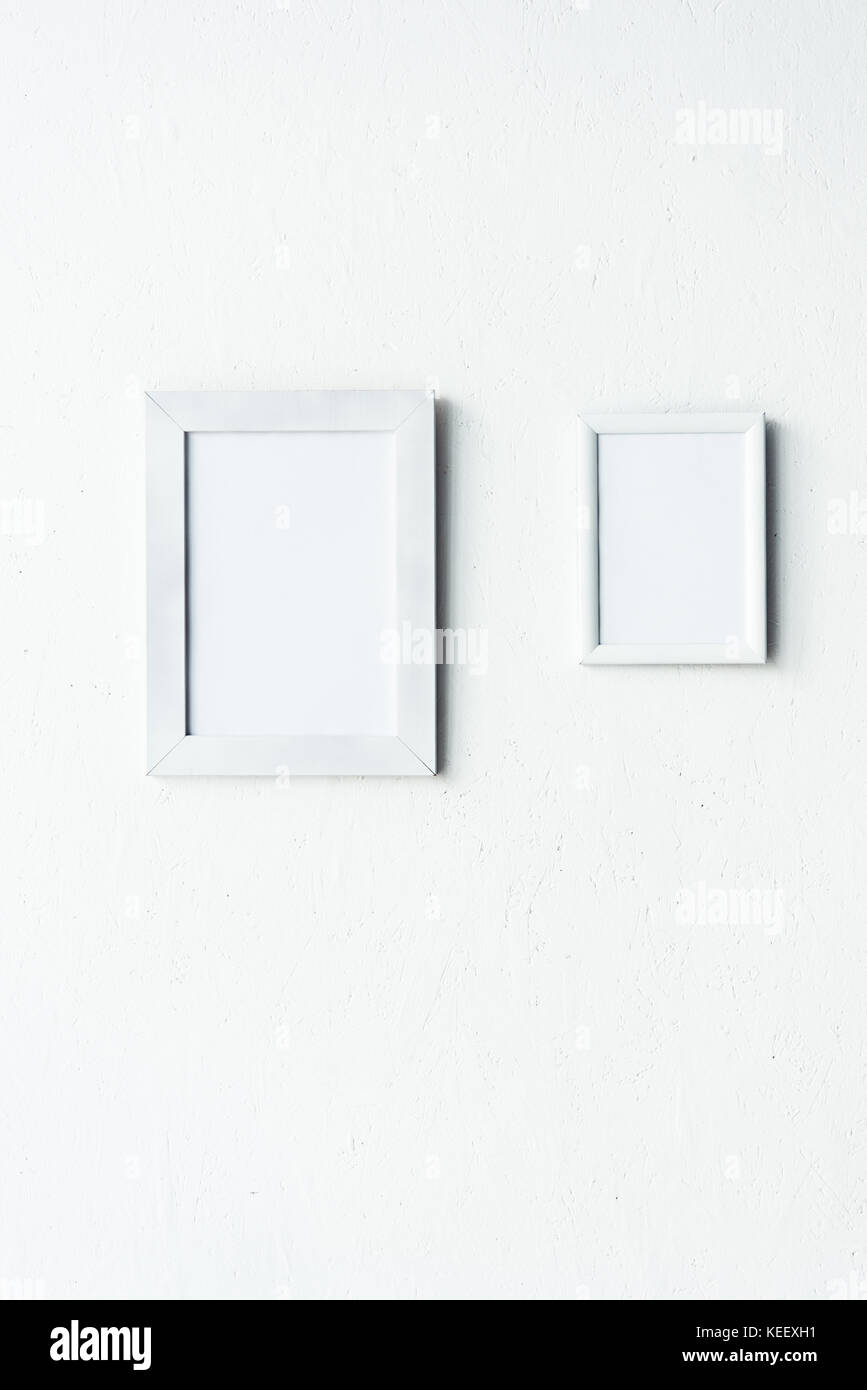 close up view of empty photo frames hanging on wall Stock Photo - Alamy