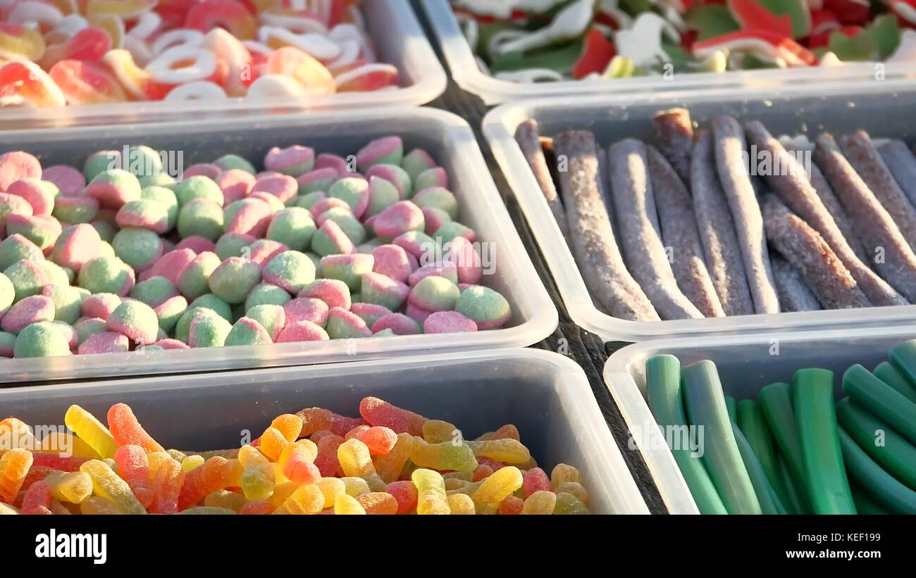 Plastic box with jelly sweets in candy shop Stock Photo - Alamy