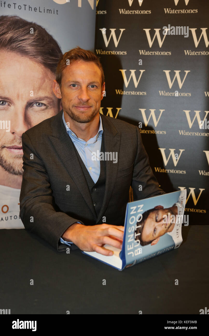 London, UK. 20th Oct, 2017. Jenson Button signs copies of his ...