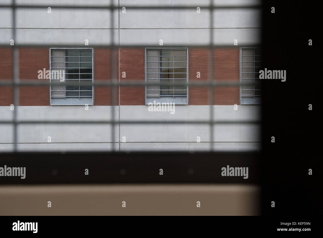 Cell windows of a new prison building pictured during a tour after the ...