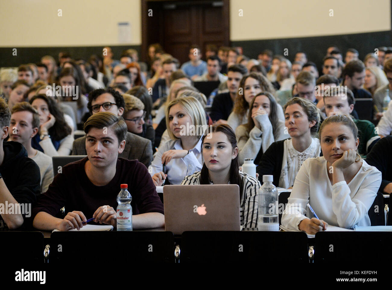 Law students sit in a lecture hall during a lecture at the University ...