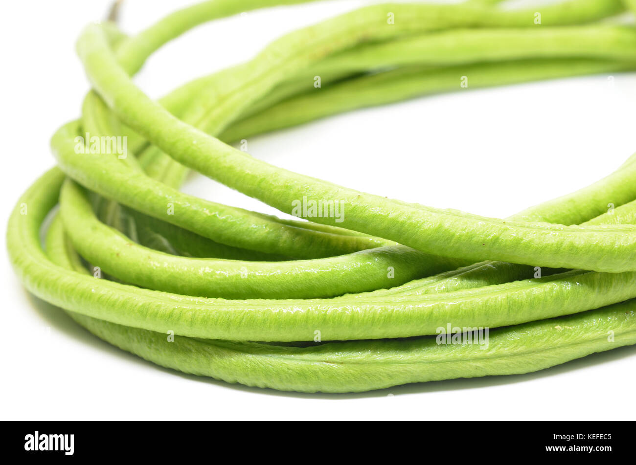 Yard long bean isolated on white background Stock Photo - Alamy