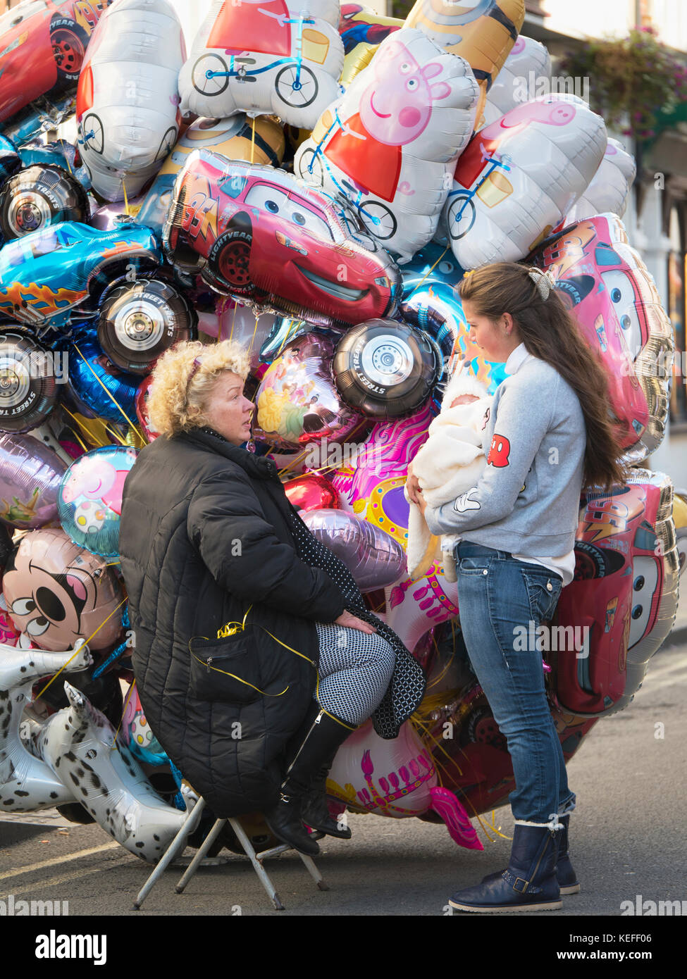 Two ladies with balloons hi-res stock photography and images - Alamy