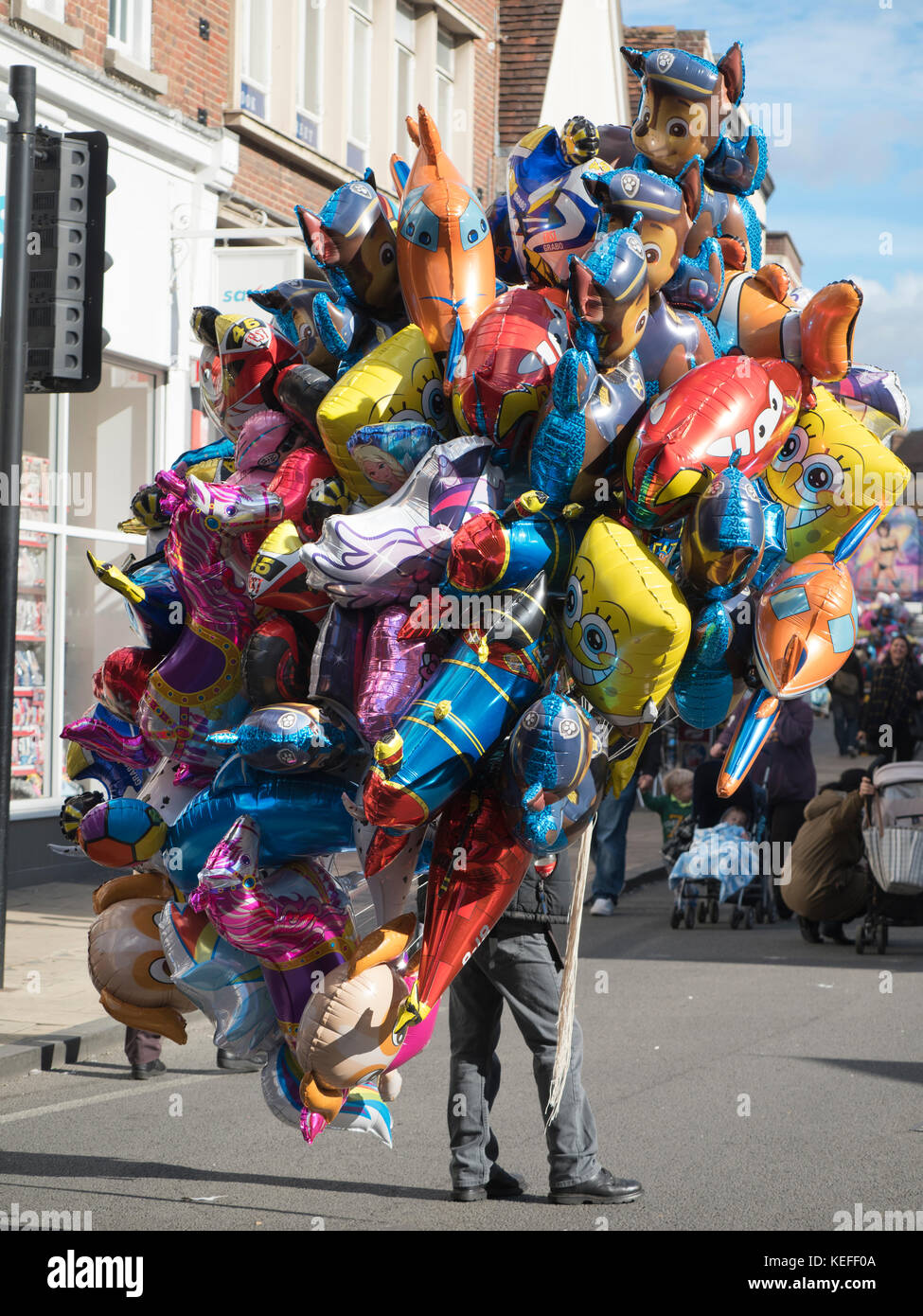 Balloons floating man hi-res stock photography and images - Alamy