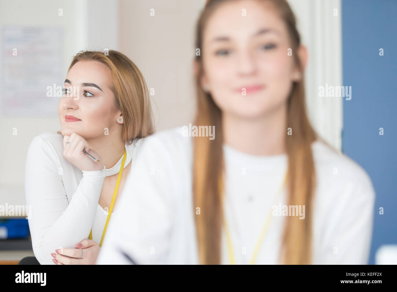 Pretty sixth form student being attentive and enjoying her school ...