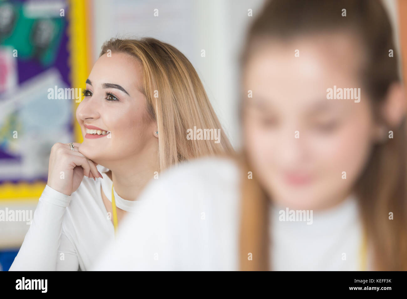 Pretty sixth form student being attentive and enjoying her school ...