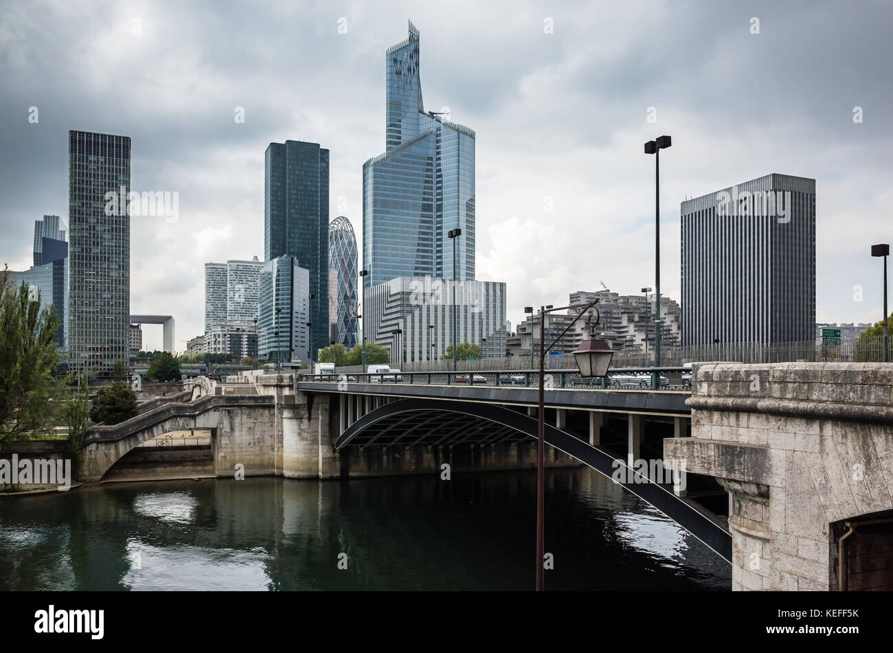 Paris La Defense business district skyline under a stormy sky with the ...