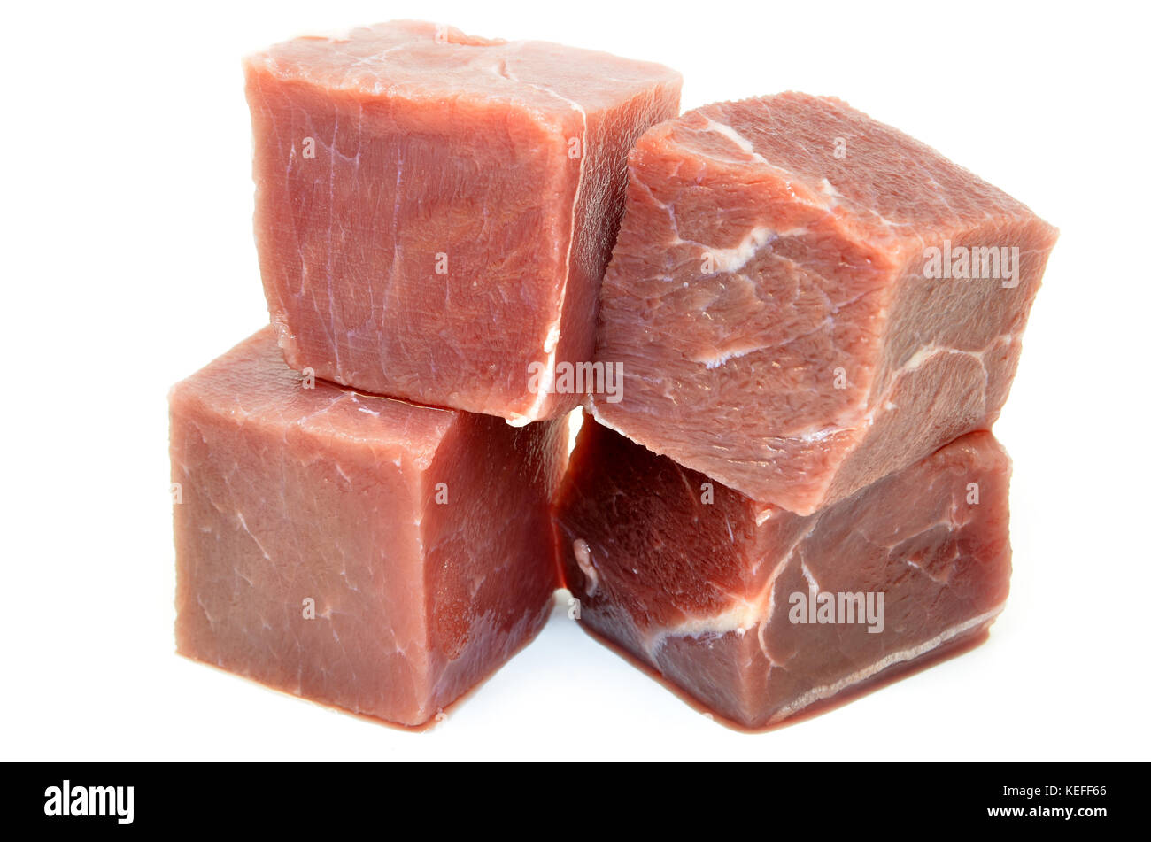 Diced or cubed raw beef steak isolated on white background Stock Photo ...