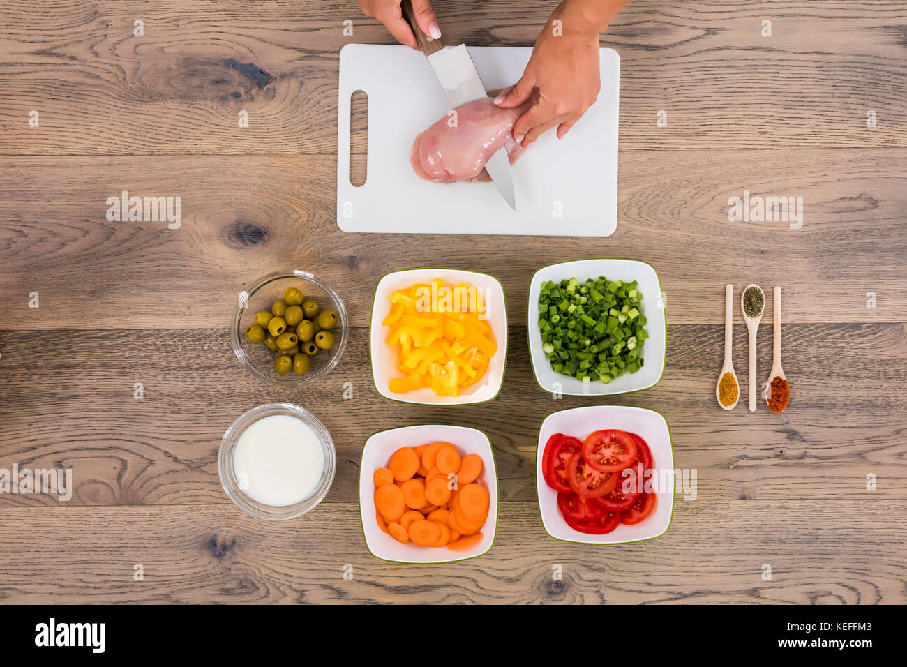 High Angle View Of Person Cutting Meat On Chopping Board With Different ...