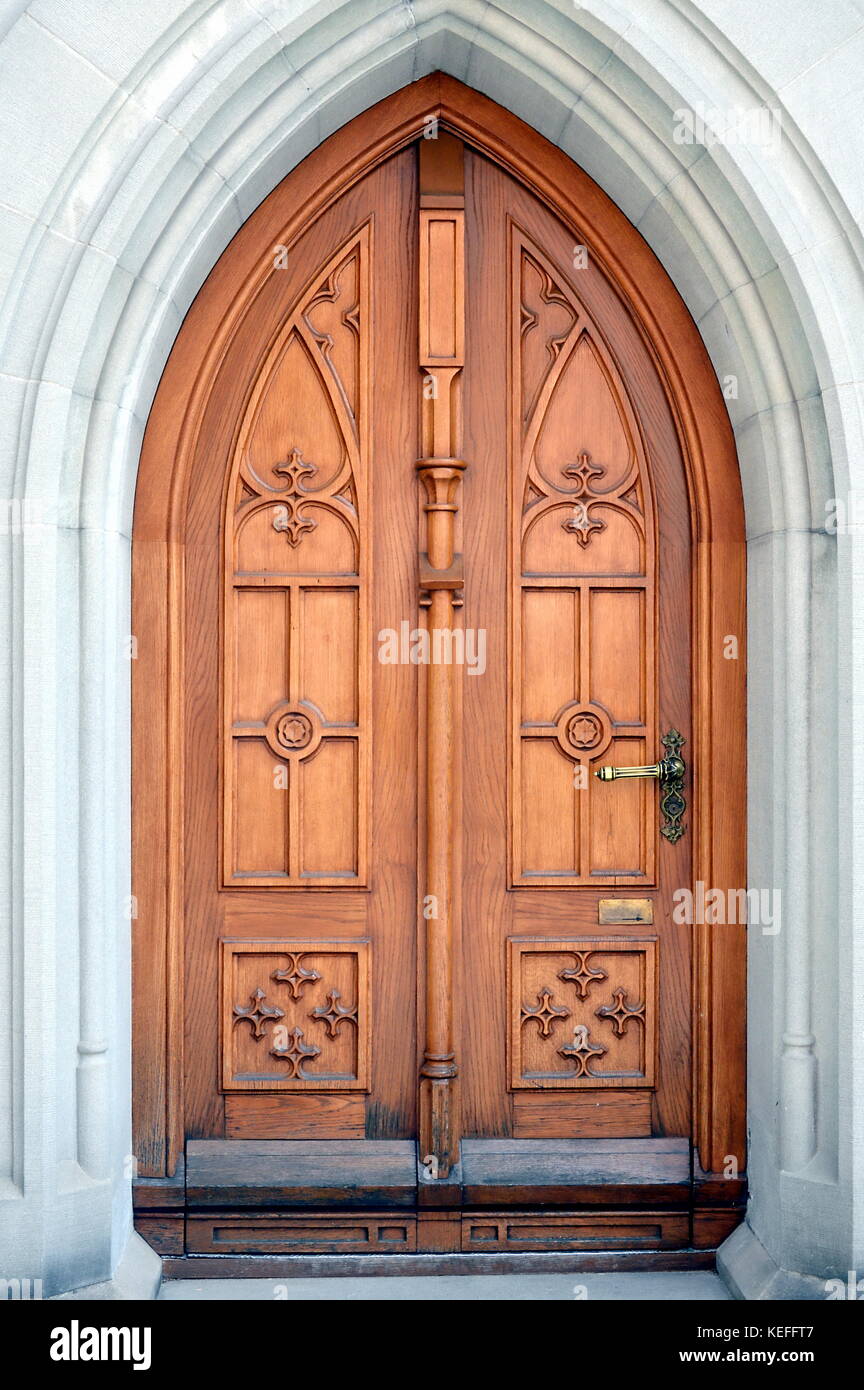 arch wooden door decoration on ancient building in Switzerland Stock ...