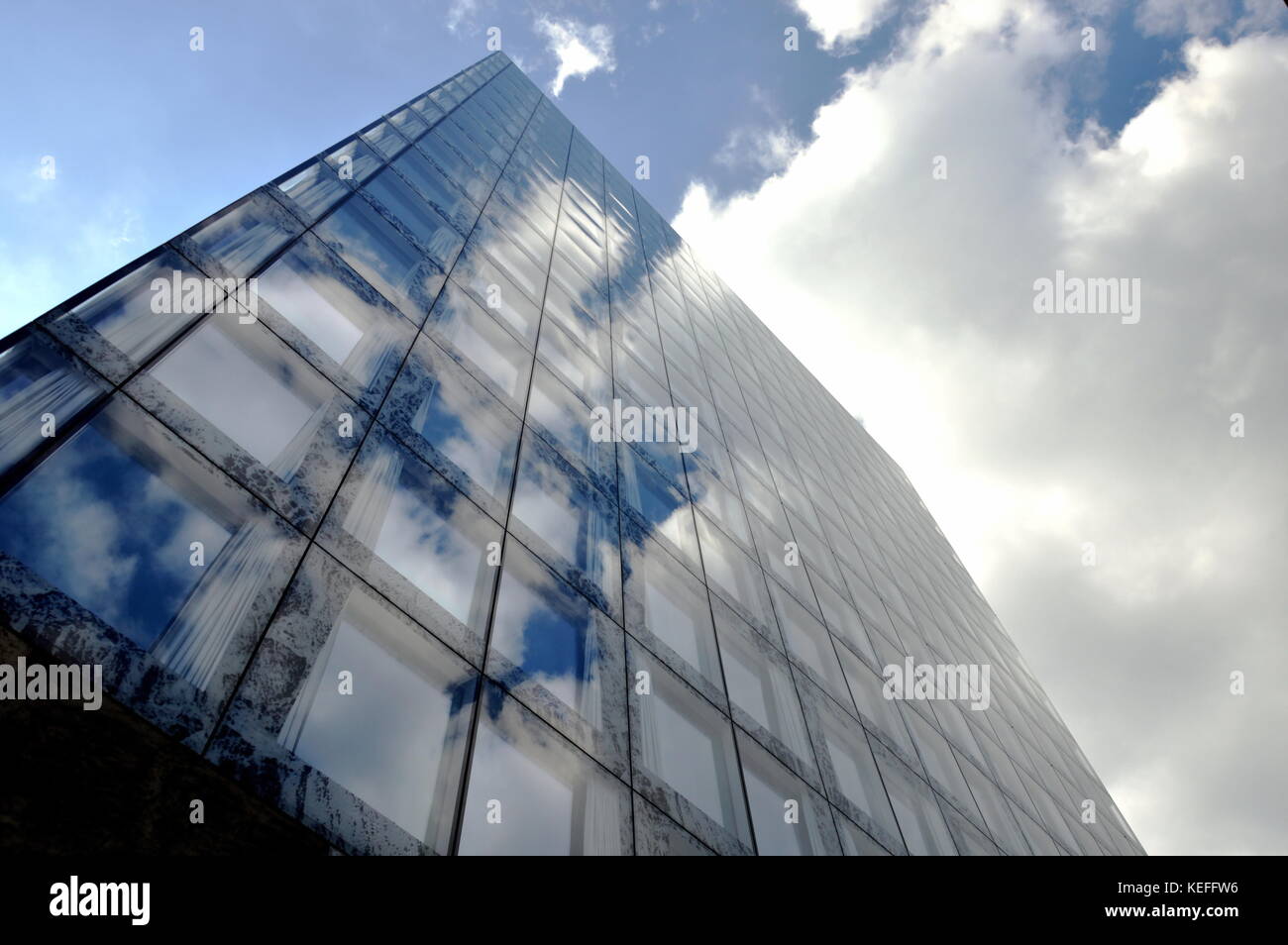 cloud and sky reflection on window glass building in switzerland Stock ...